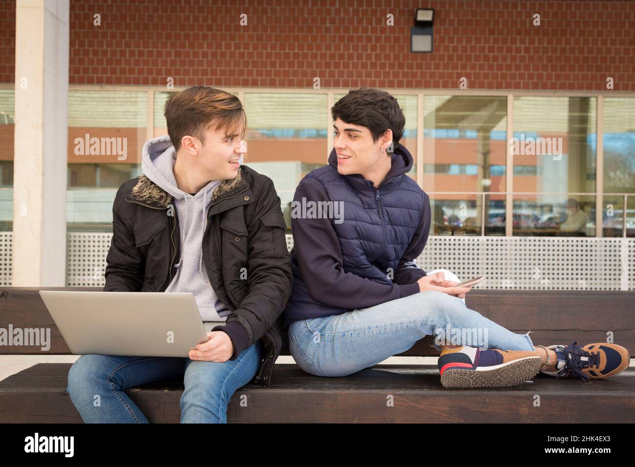 Happy gay couple looking other hi-res stock photography and images - Alamy
