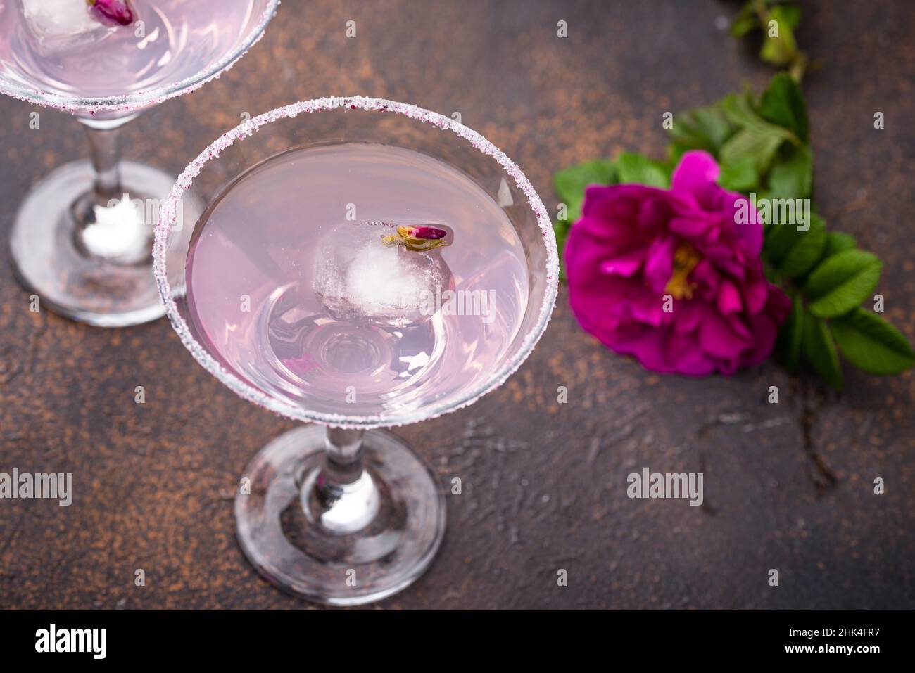 Pink martini cocktail with rose syrup Stock Photo - Alamy