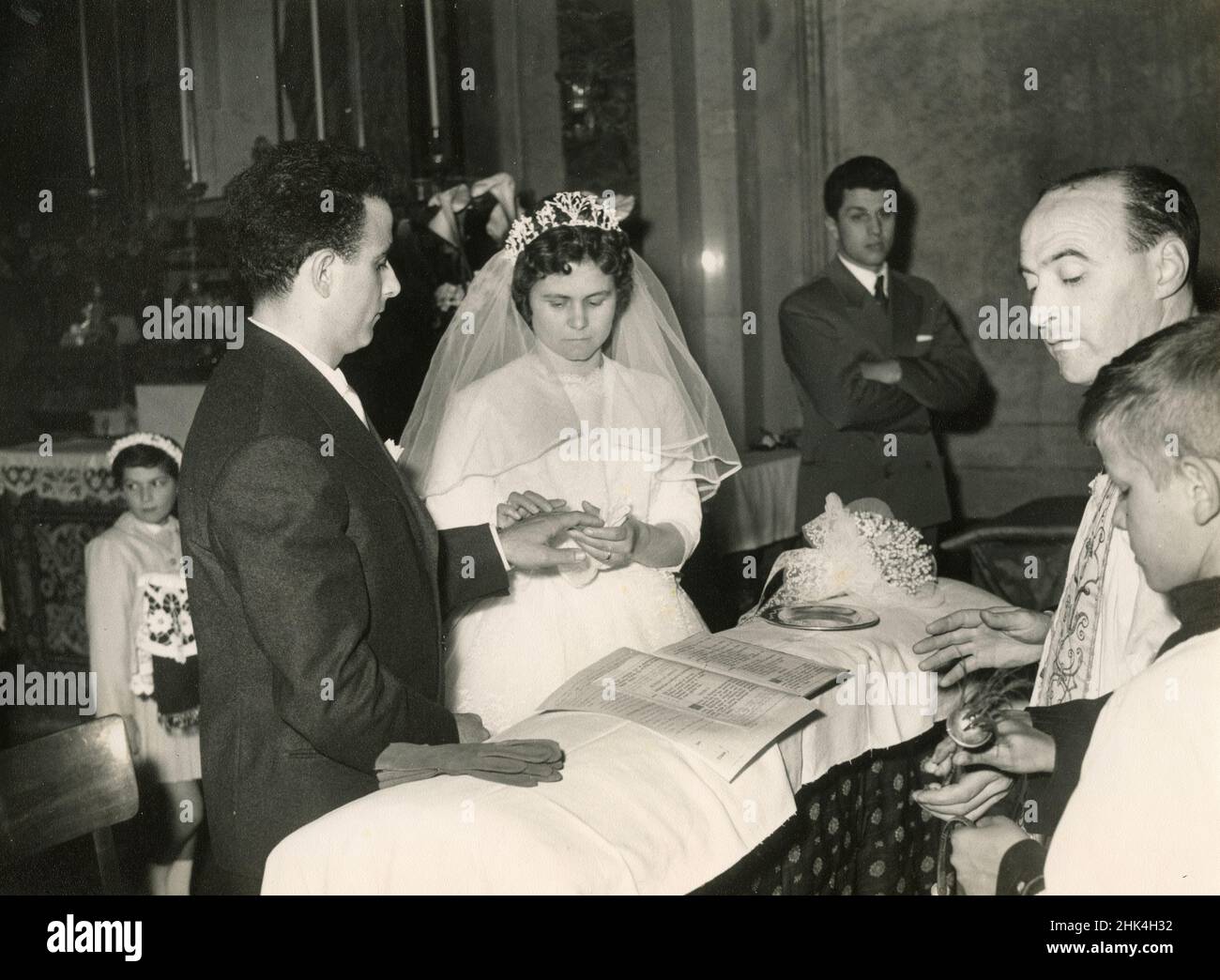 Wedding in Italy during the 1950s: The bride and the groom being ...