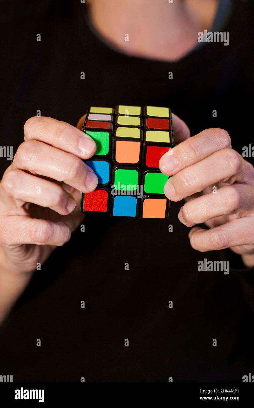 Cube in hand hi-res stock photography and images - Alamy