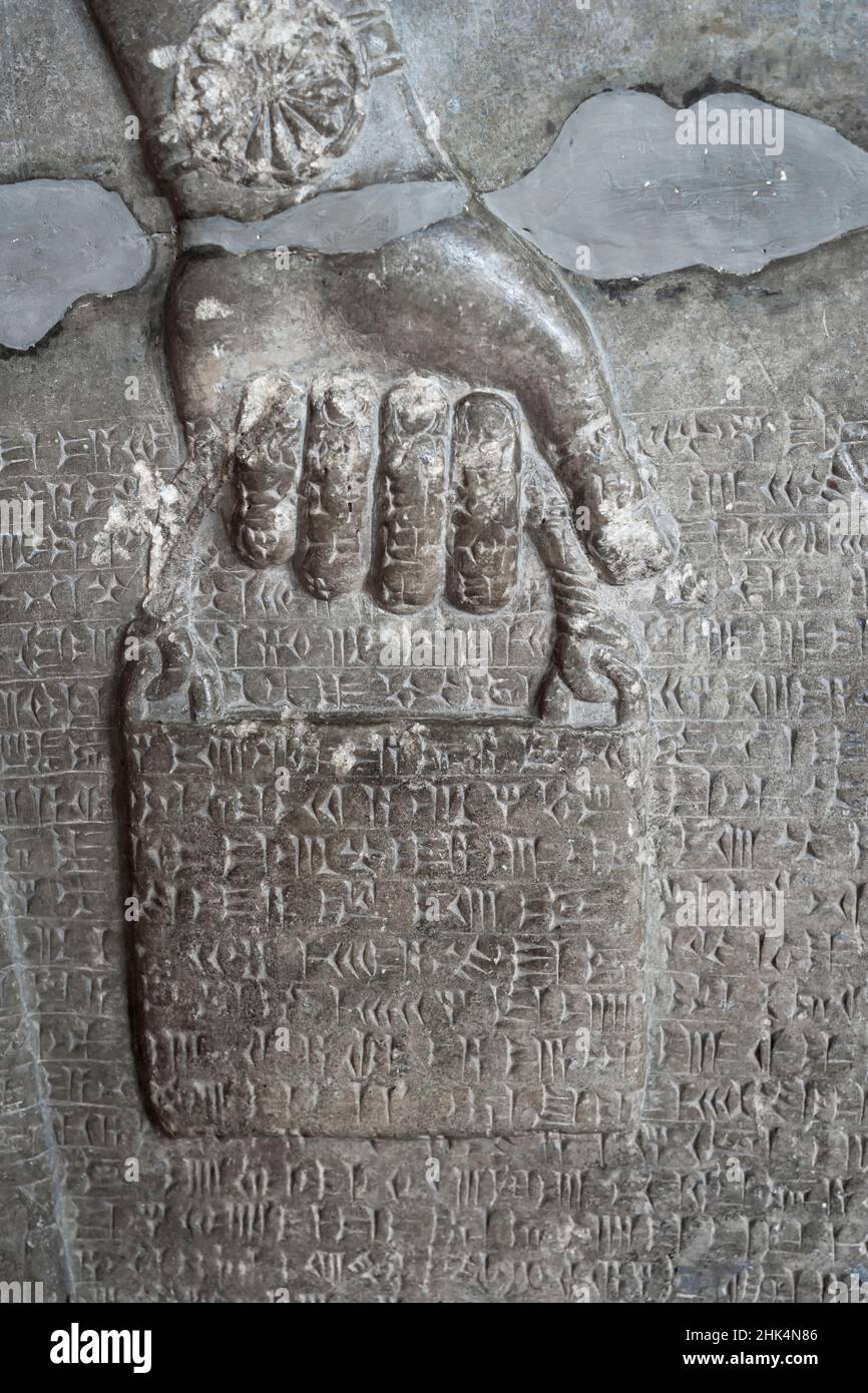 Ancient relief depicting a pail of holy water, carried by a winged ...