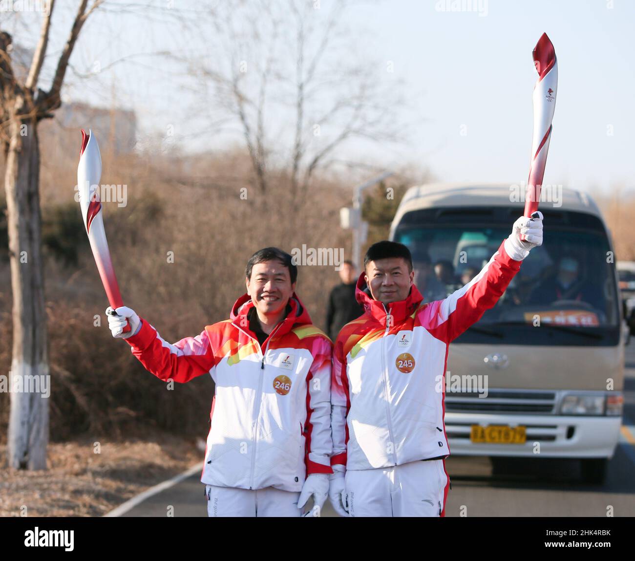 Beijing, China. 2nd Feb, 2022. Torch bearers Tang Wenwei (L) and Liu ...