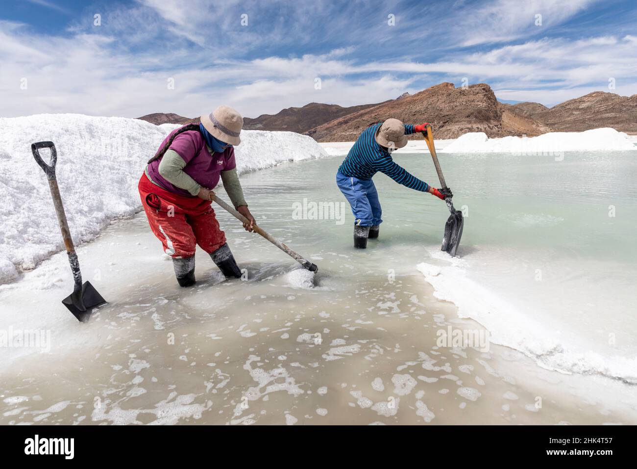 Salt workers near Coqueza, a small town near the Thunupa Volcano, Salar ...