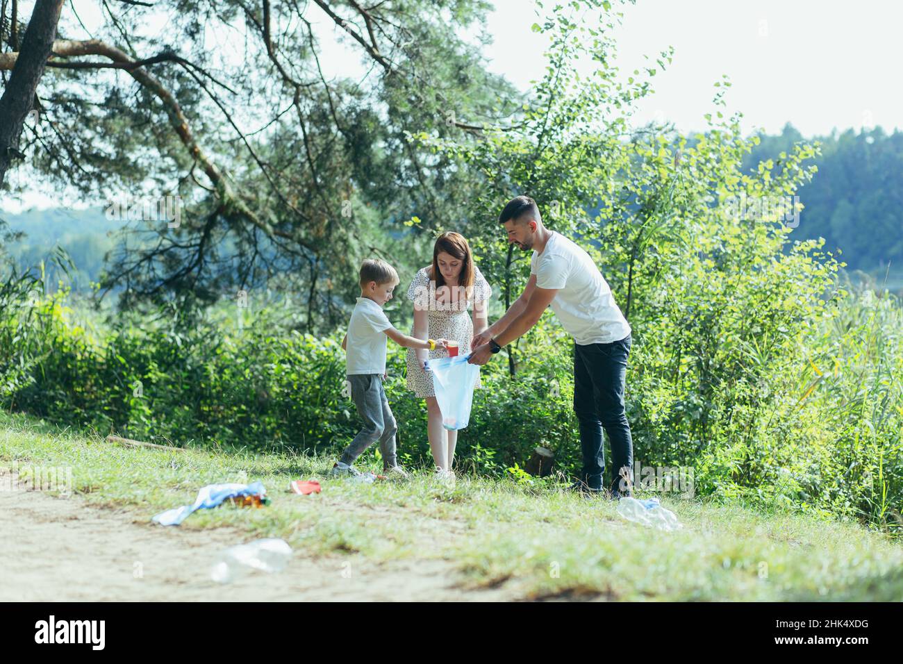 Happy children rubbish environment hi-res stock photography and images ...