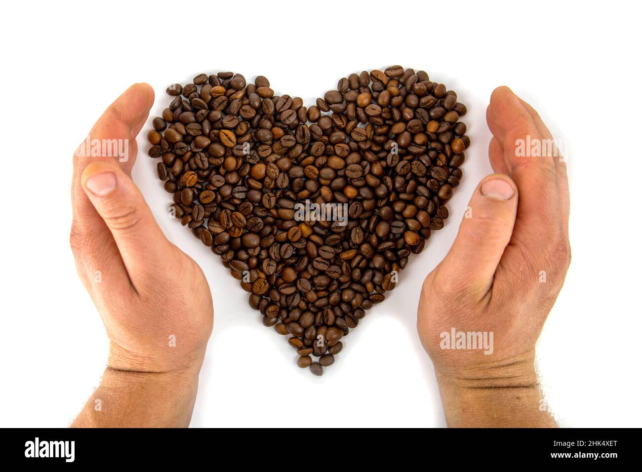 Hands holding hot coffee Cut Out Stock Images & Pictures - Alamy