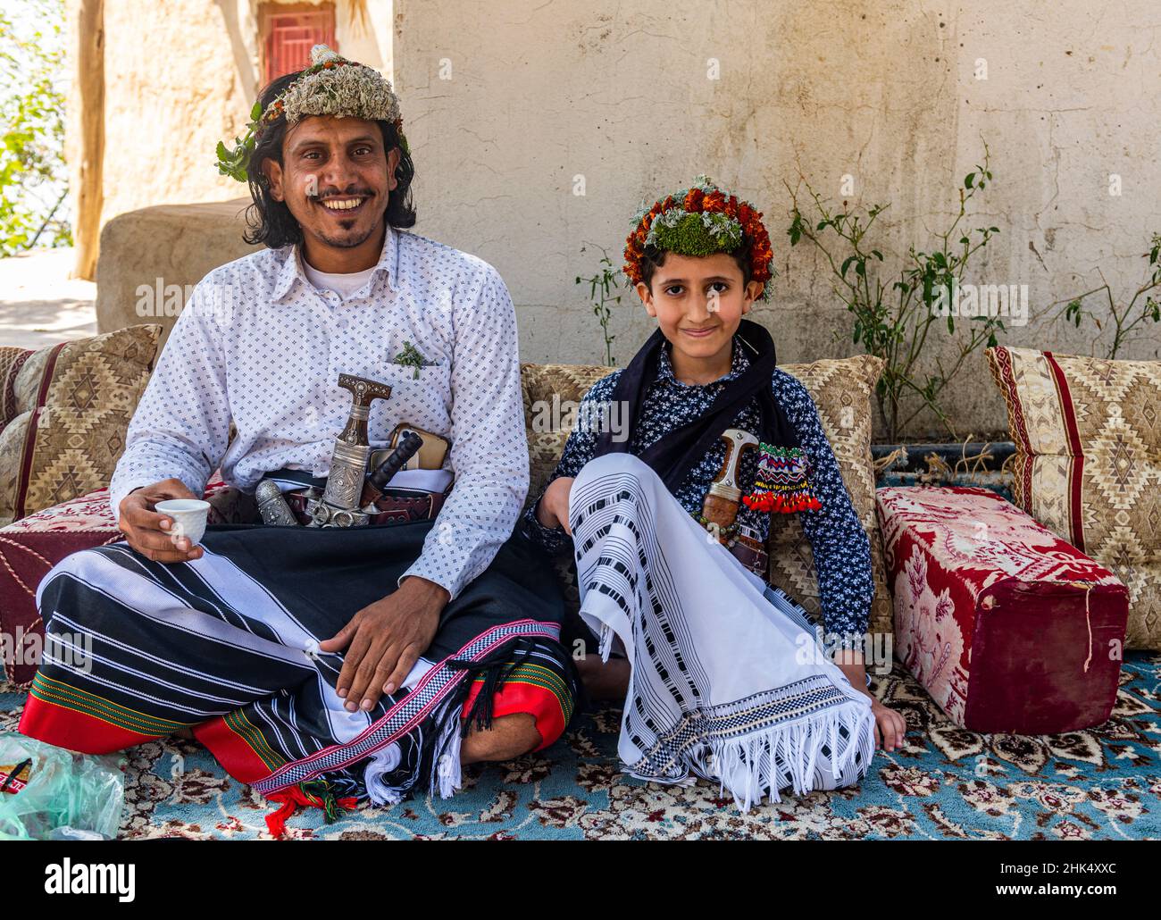 Traditional dressed man of the Qahtani Flower men tribe with a young ...