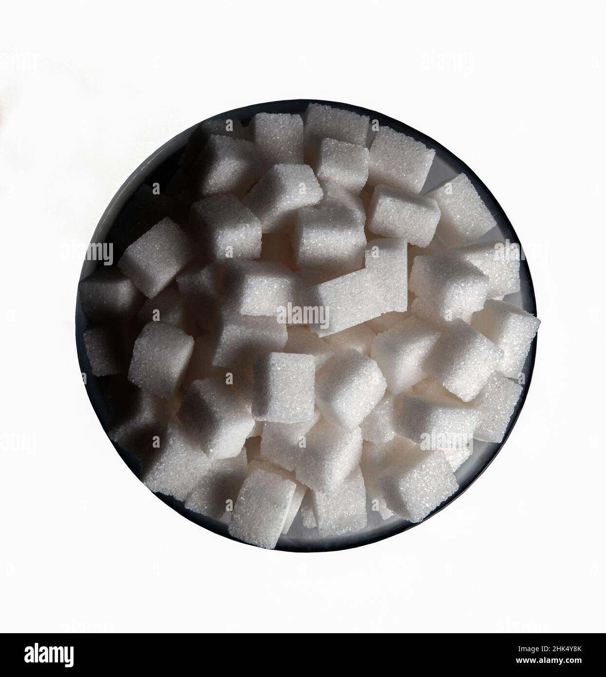 White sugar cubes in a glass bowl, on a white background Stock Photo ...
