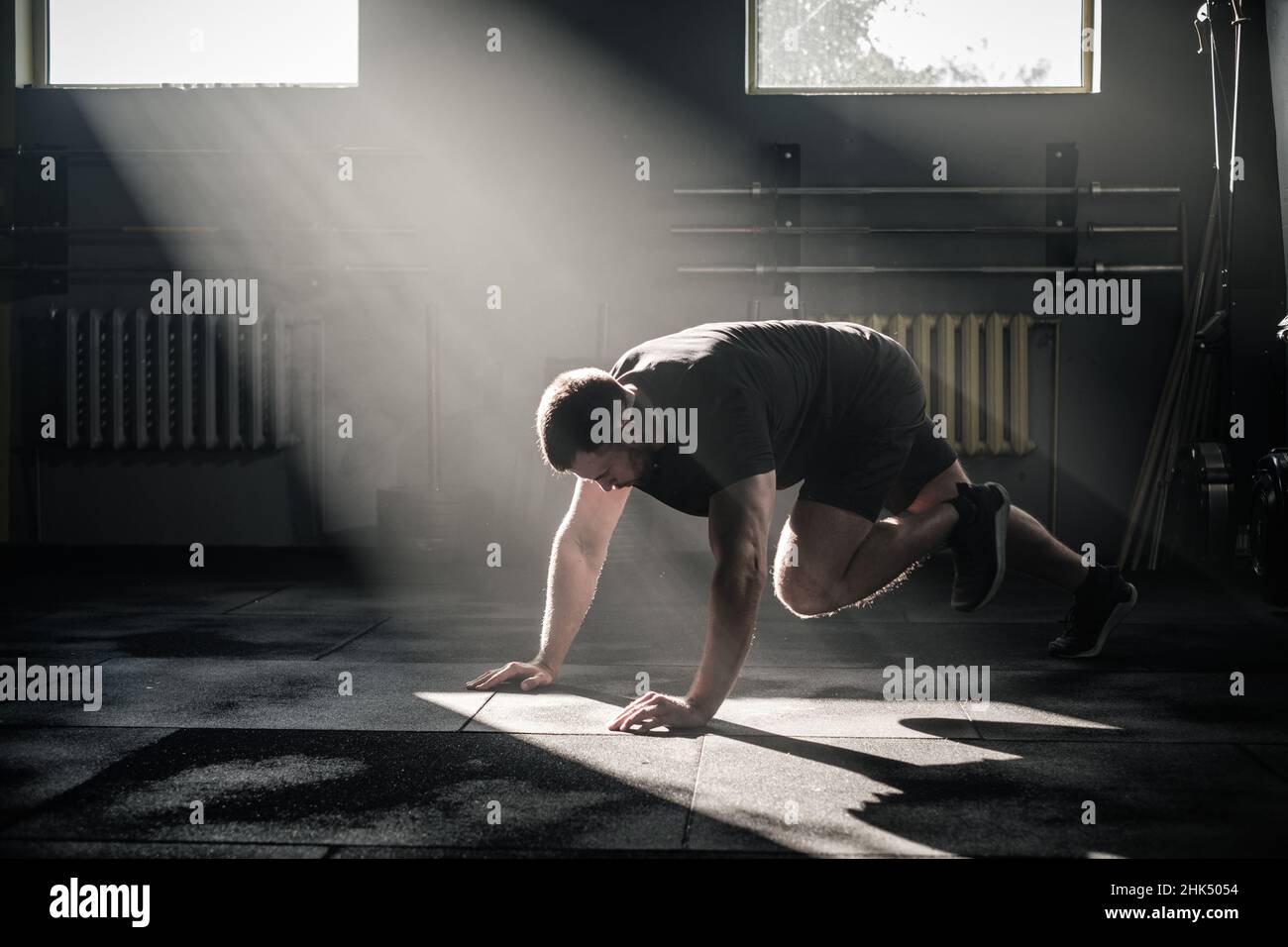 Athletic Man Do Running Plank Stock Photo - Alamy