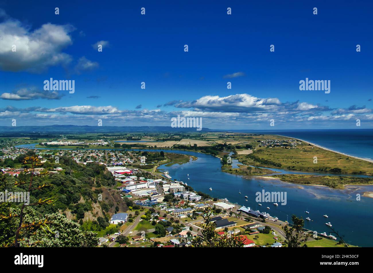 View of the town of Whakatane, the Whakatane River and the Pacific ...