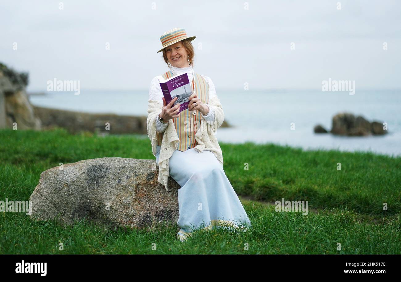 Anne Tyrrell Gogan reads a copy of Ulysses on Sandycove Point, Dublin ...