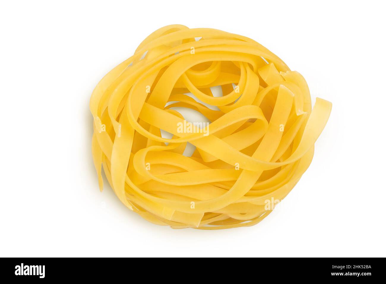 Raw tagliatelle pasta isolated on white background with clipping path ...