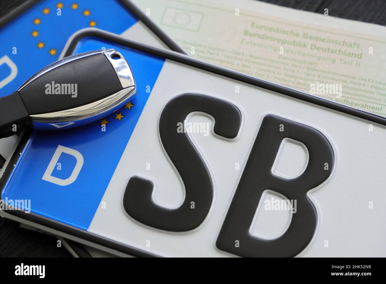 License plate with a car key Stock Photo - Alamy