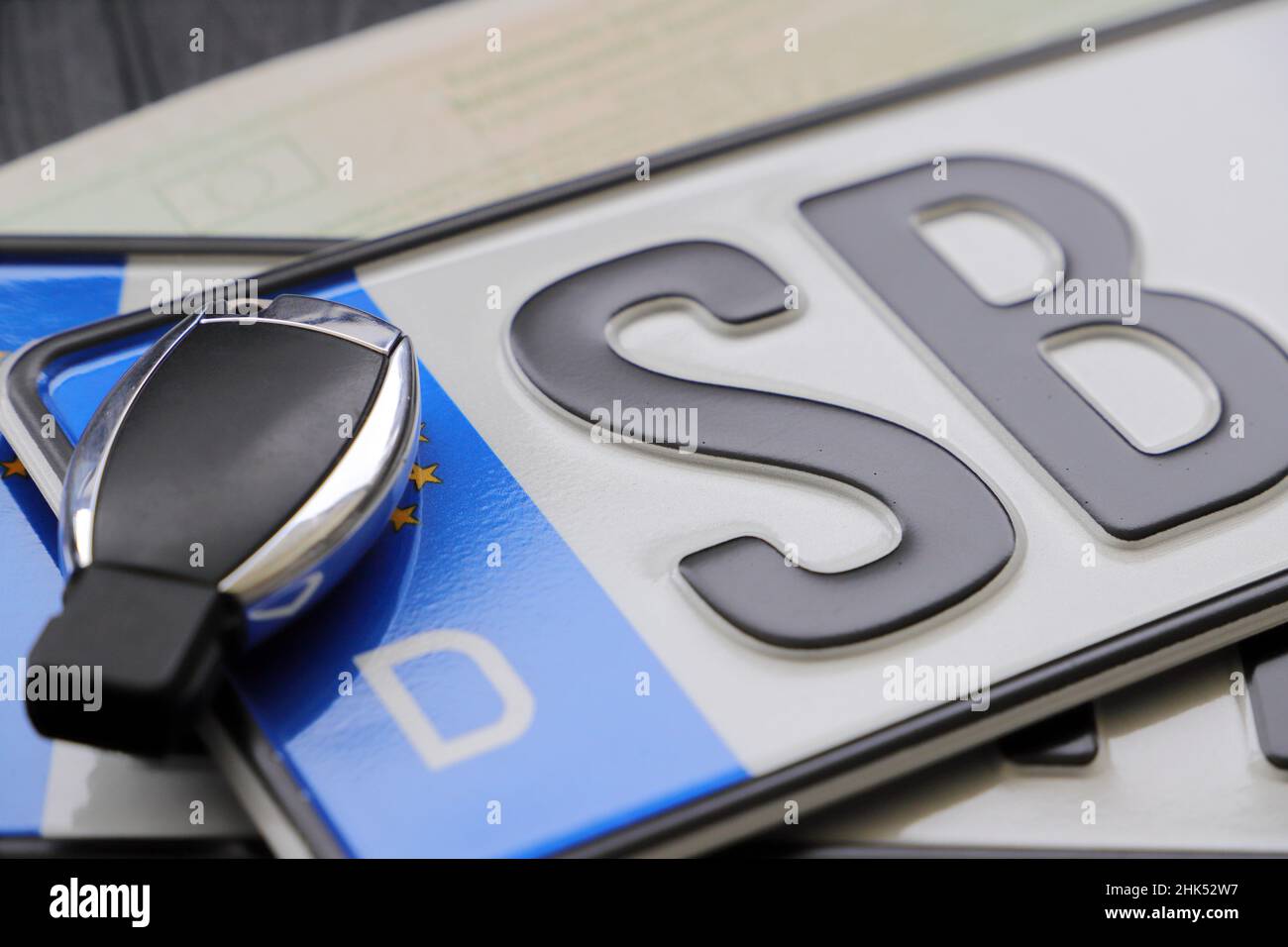 License plate with a car key Stock Photo - Alamy