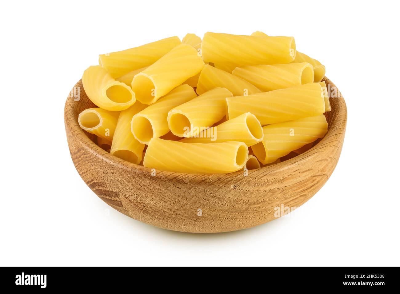 raw italian Rigatoni pasta in wooden bowl isolated on white background ...