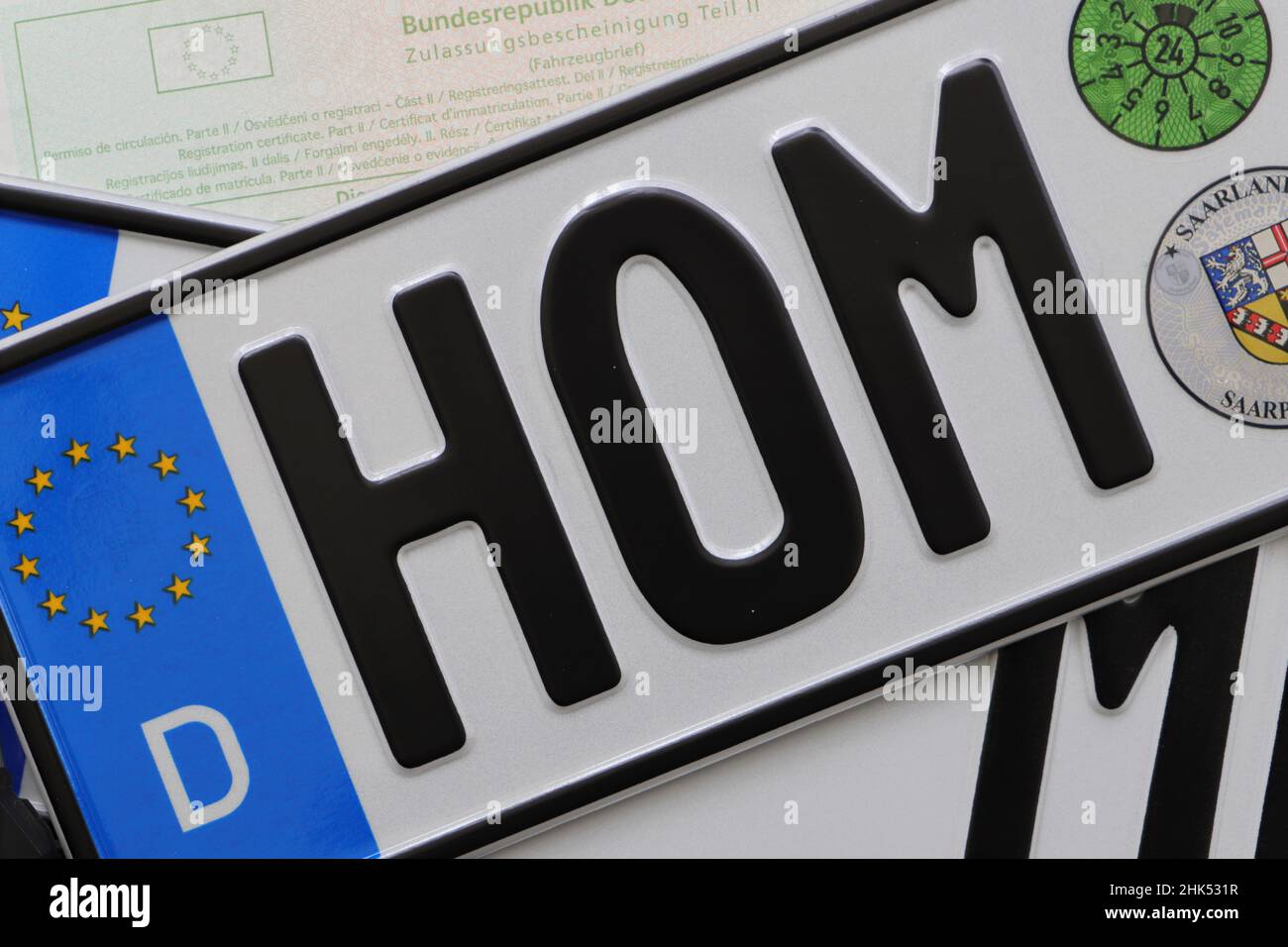 License plate with a car key Stock Photo - Alamy