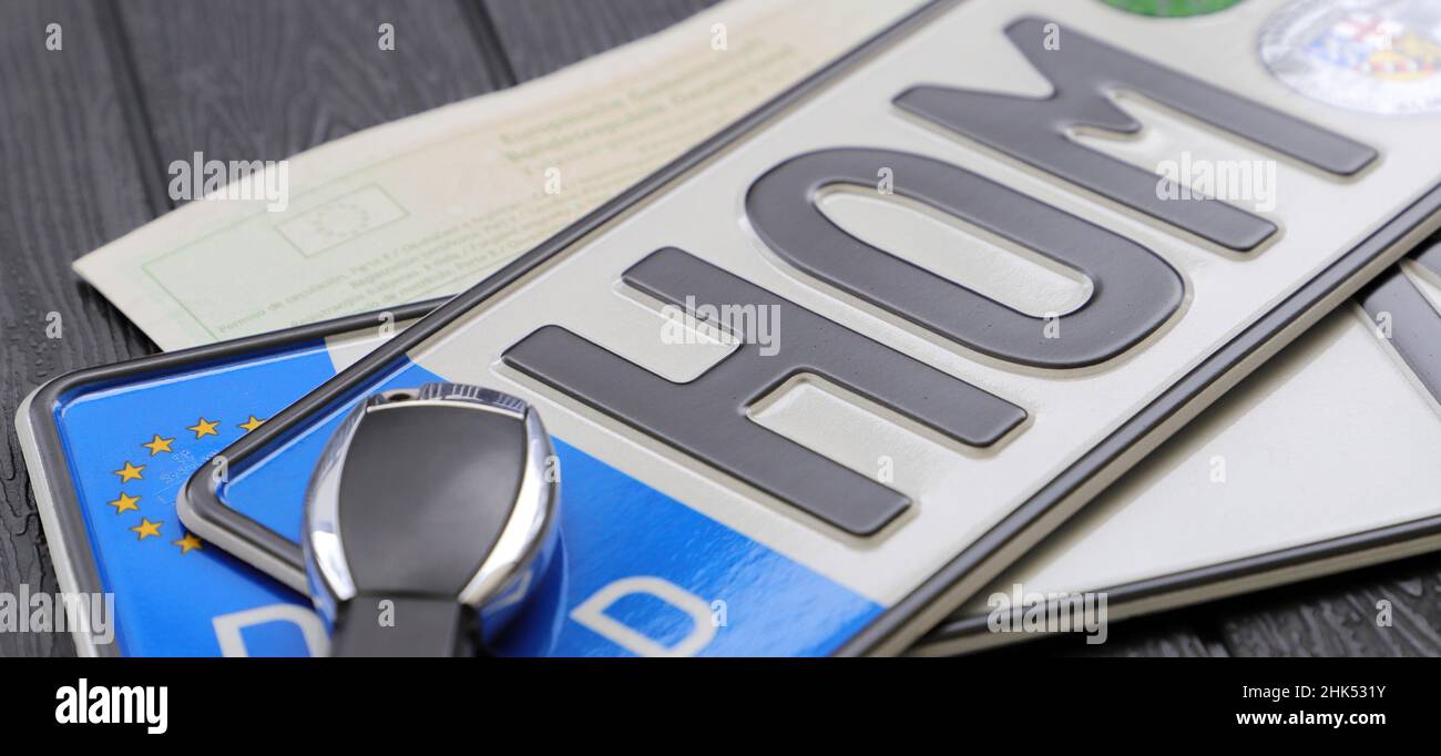 License plate with a car key Stock Photo - Alamy
