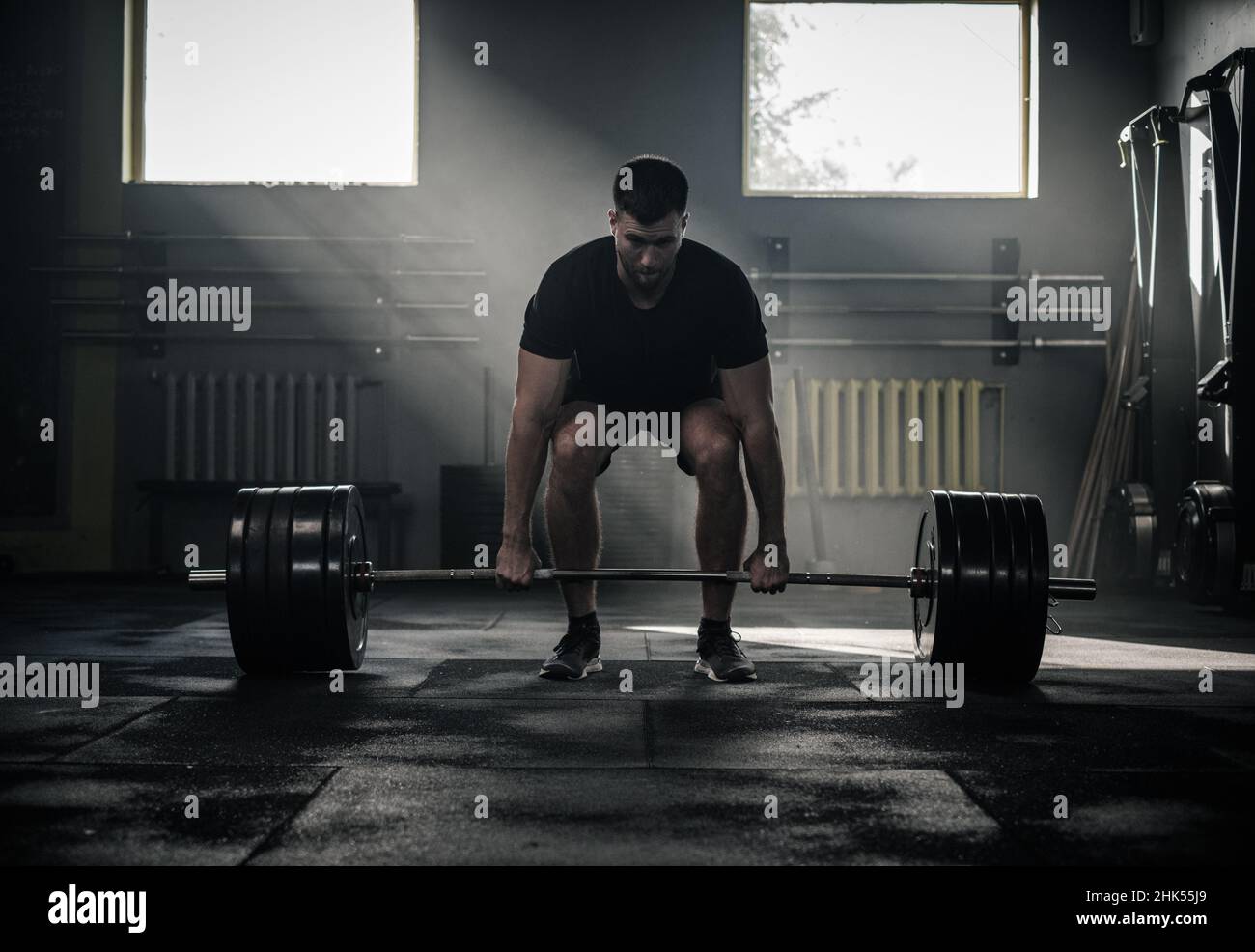 Muscular and Athletic Bodybuilder Lift Barbell Stock Photo - Alamy