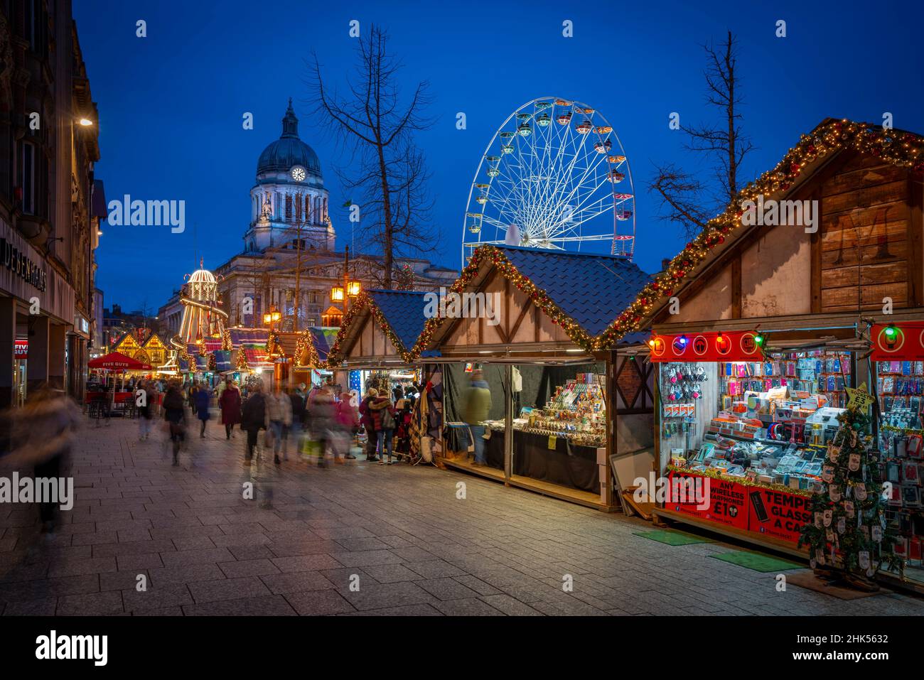 View of Christmas market stalls, ferris wheel and Council House on Old ...