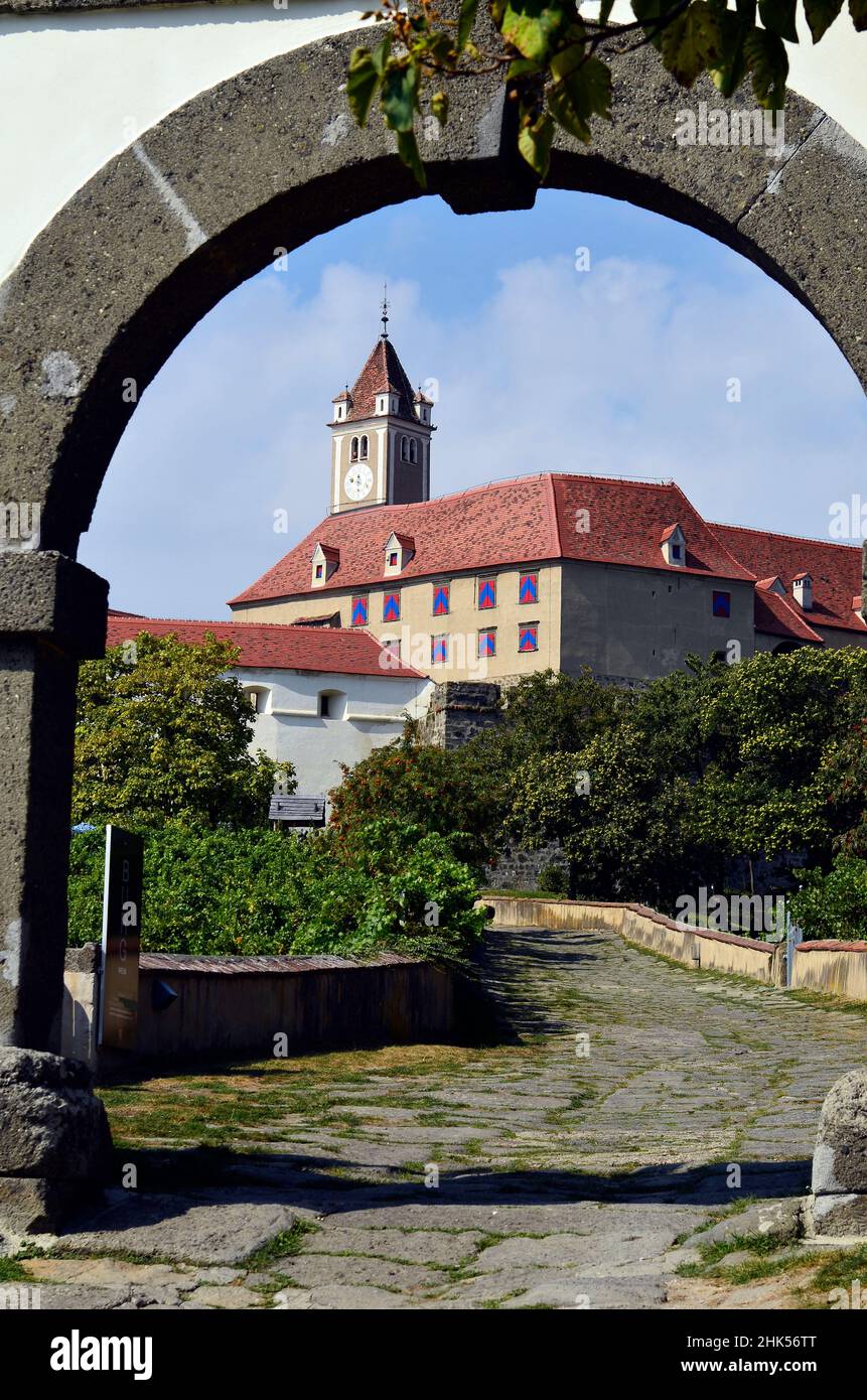 Austria, the medieval fortified castle is enthroned on a rock above the ...