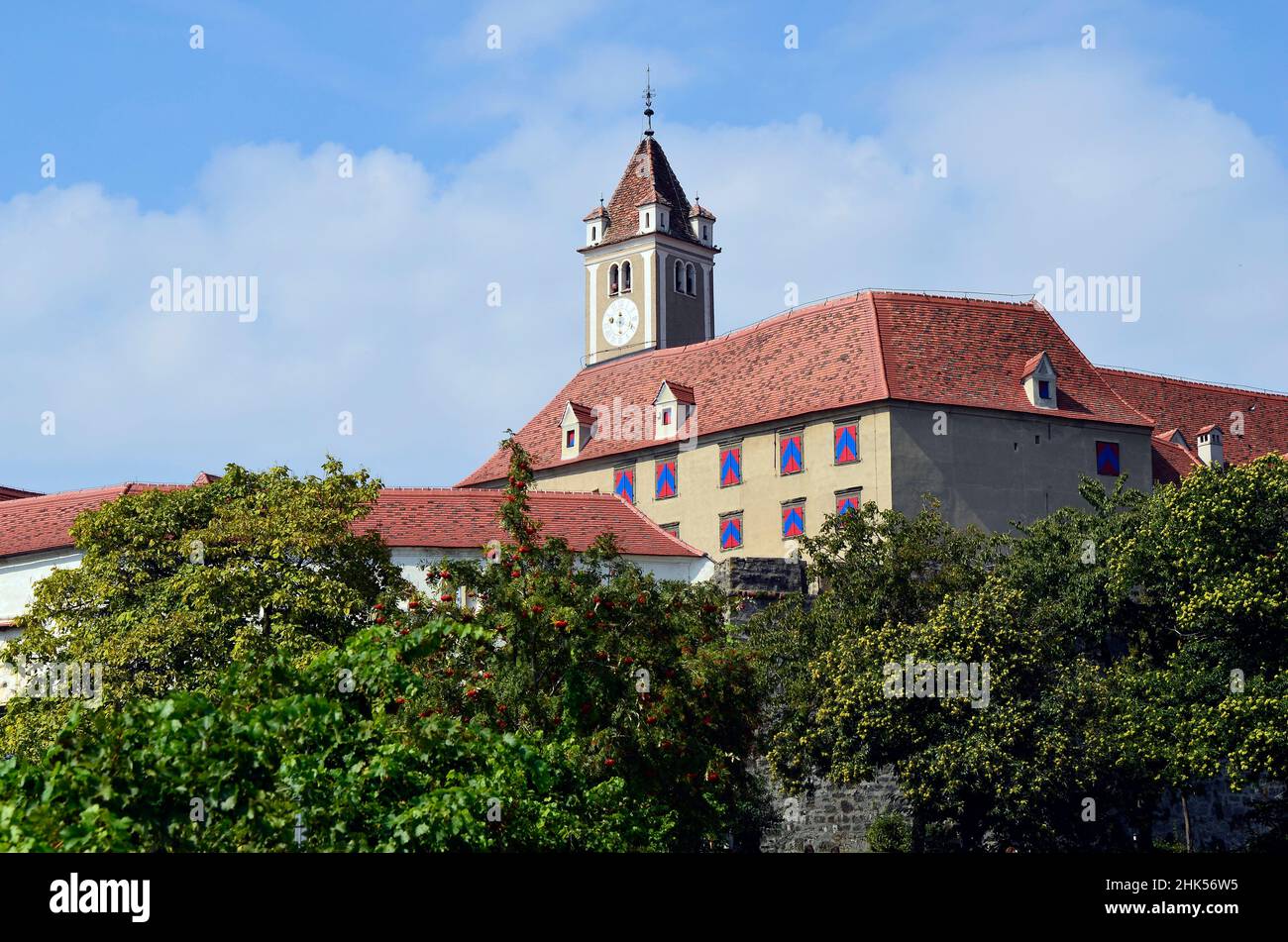 Austria, the medieval fortified castle is enthroned on a rock above the ...