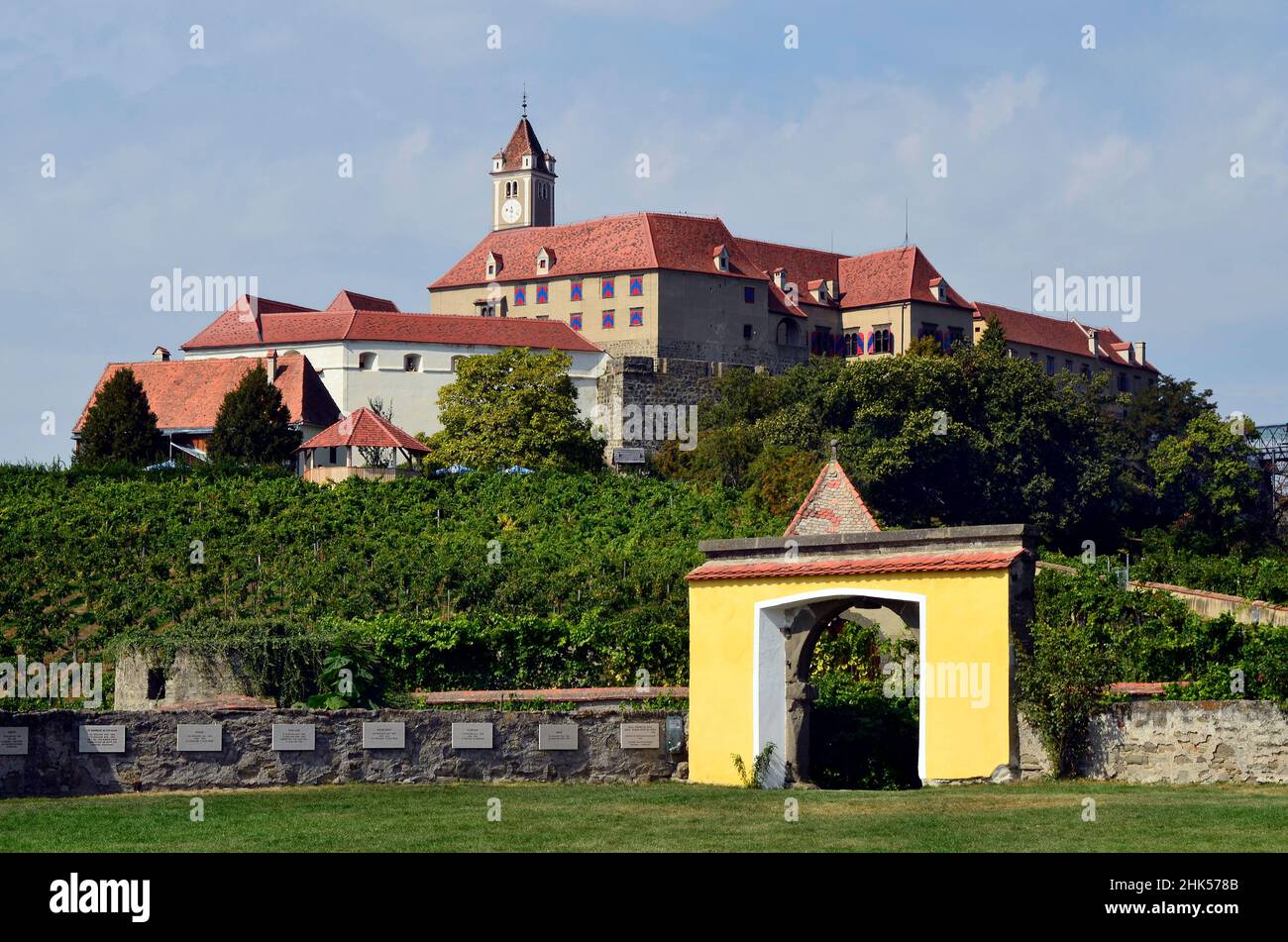 Austria, the medieval fortified castle is enthroned on a rock above the ...