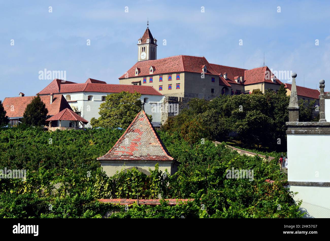 Austria, the medieval fortified castle is enthroned on a rock above the ...