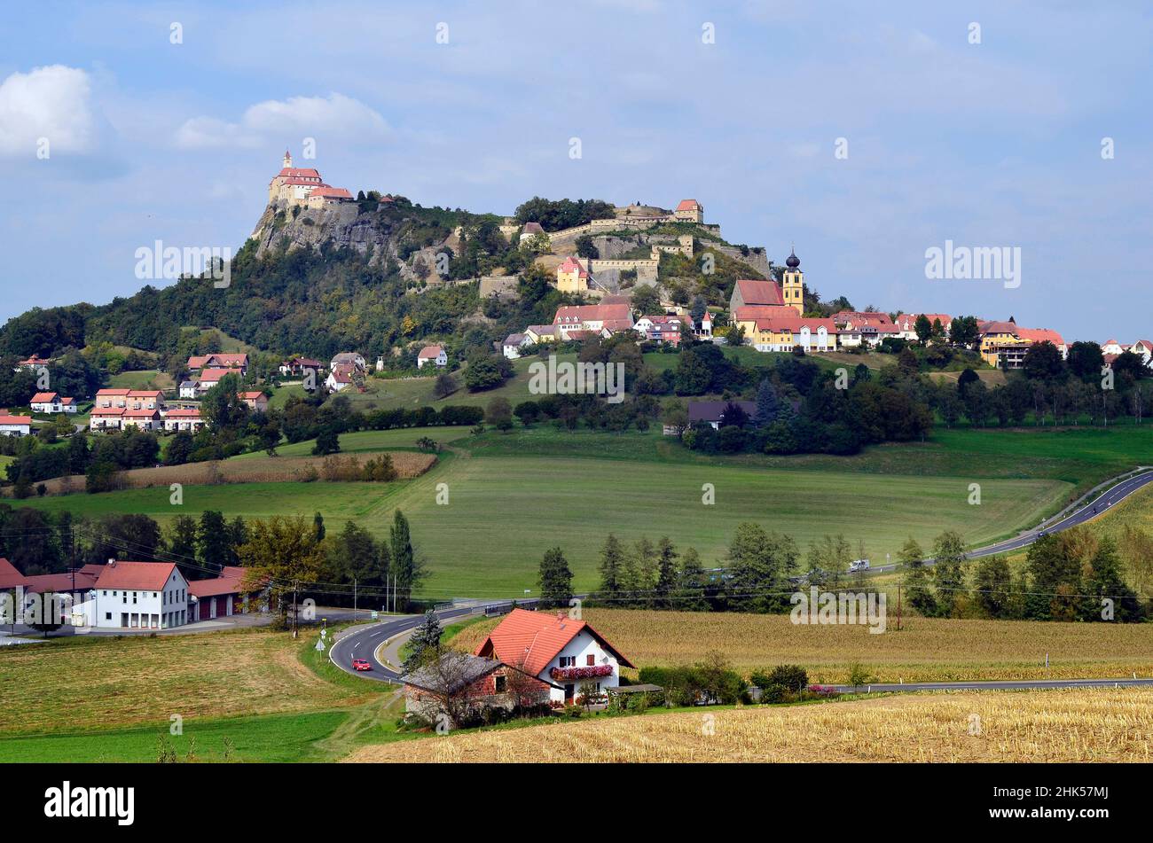 Austria, the medieval fortified castle is enthroned on a rock above the ...