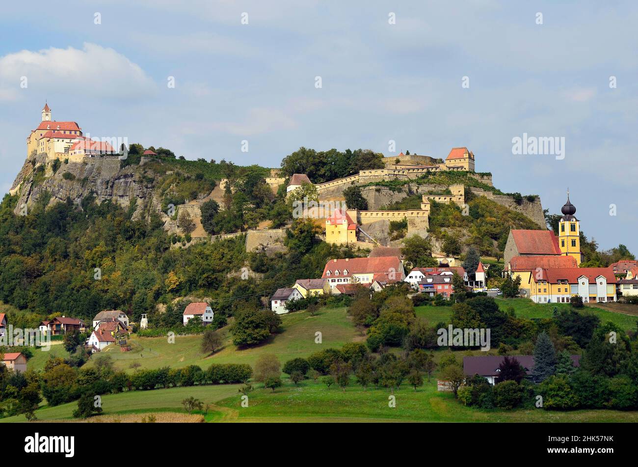 Austria, the medieval fortified castle is enthroned on a rock above the ...