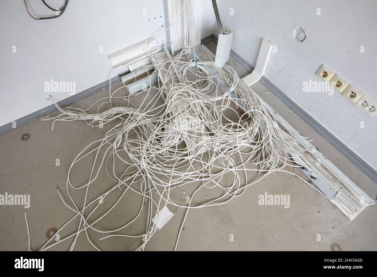 There is a pile of electrical wires on the floor Stock Photo - Alamy