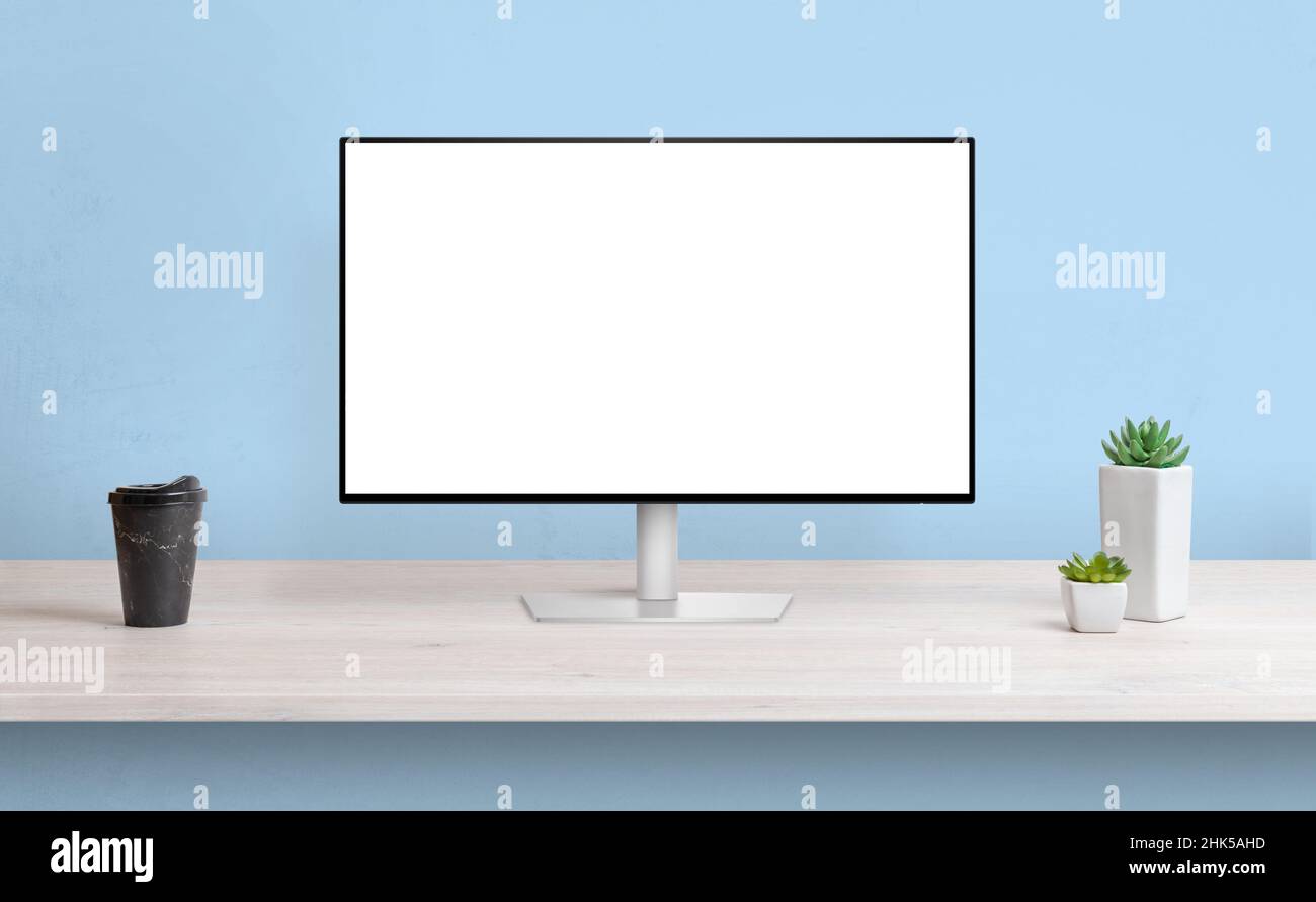 Computer display on work desk with isolated screen for web page ...