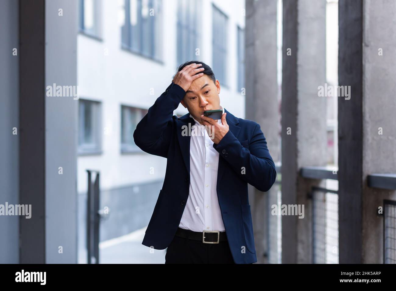 angry and serious Successful Asian businessman explains information to ...