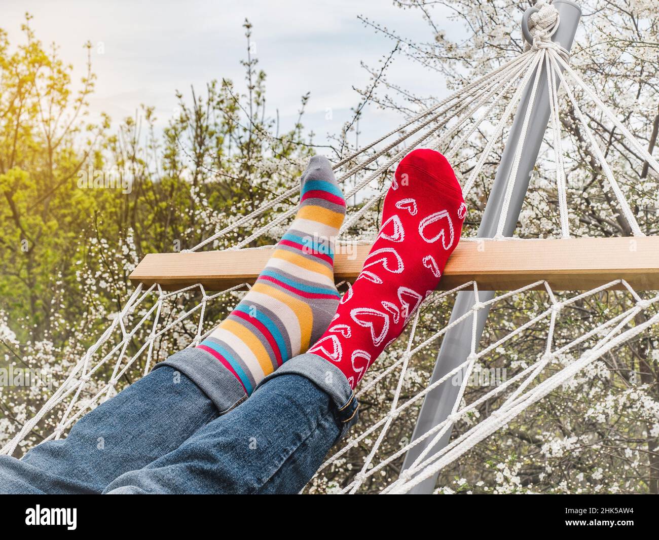 Men's legs and bright socks. Close-up, outdoor. Style, beauty and ...