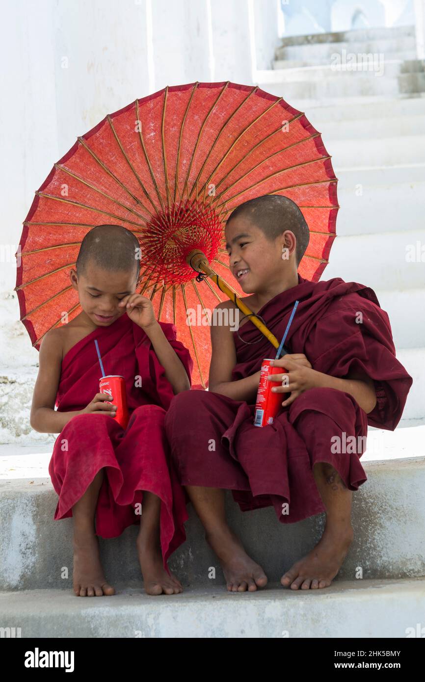 Buddhist monk drinking coca cola hi-res stock photography and images ...