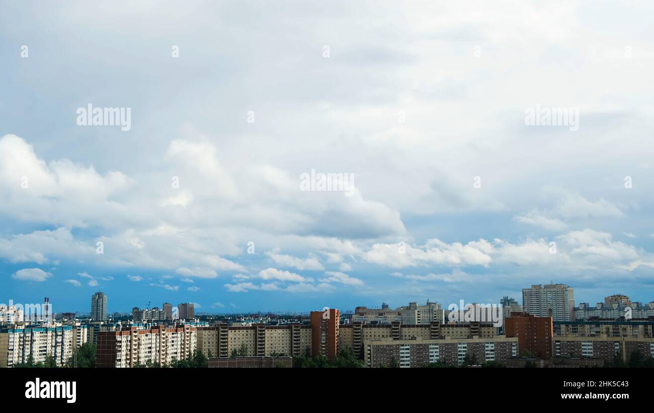 Panoramic view of city background blue sky with floating clouds ...