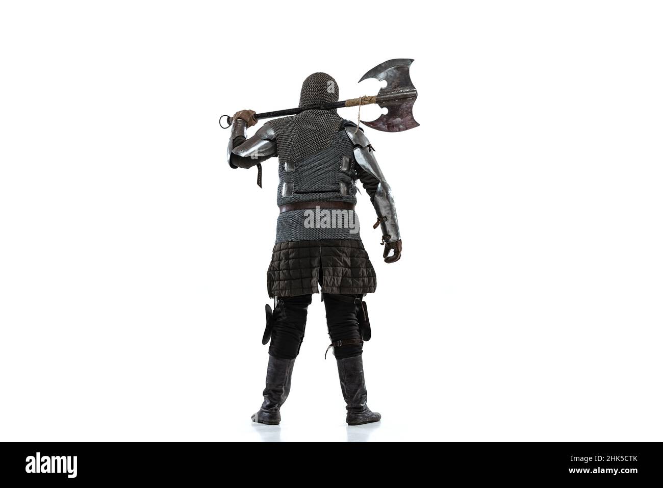 Portrait of brutal brave man in costume of medieval warrior, knight ...