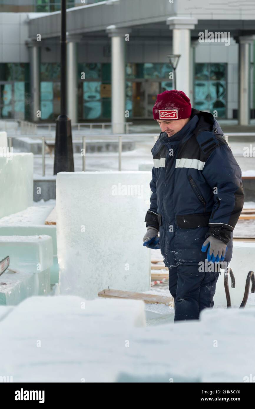 Portrait of a worker installer in uniform at the ice panel Stock Photo ...