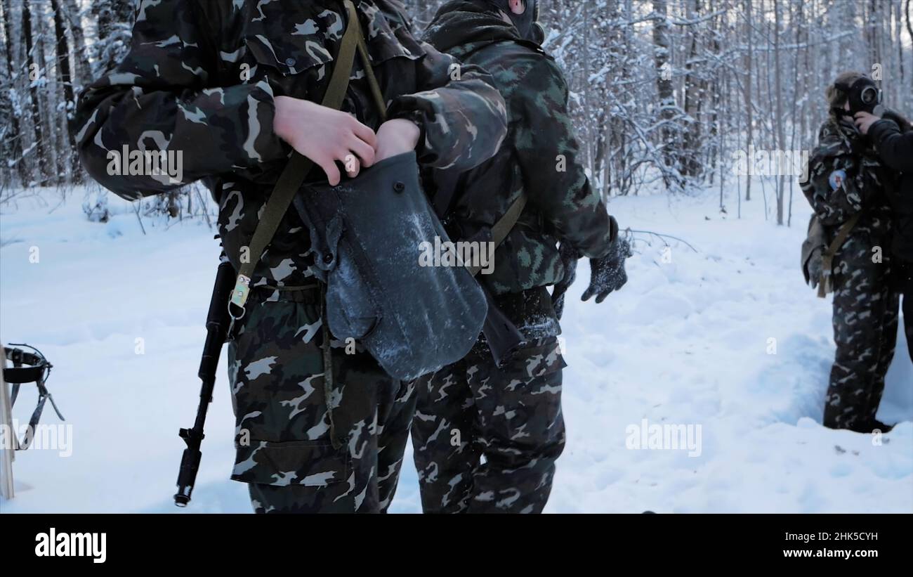 Group of special forces weapons in cold forest. Clip. Soldiers on ...