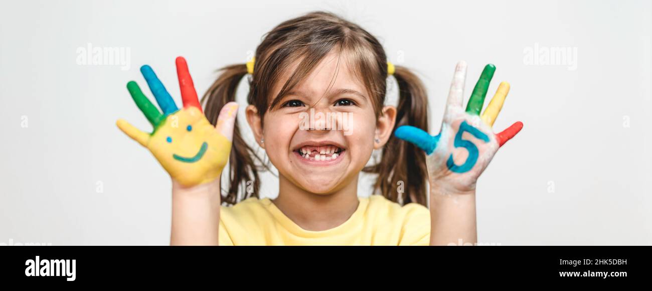 Horizontal banner or header with happy toothless little girl with the ...