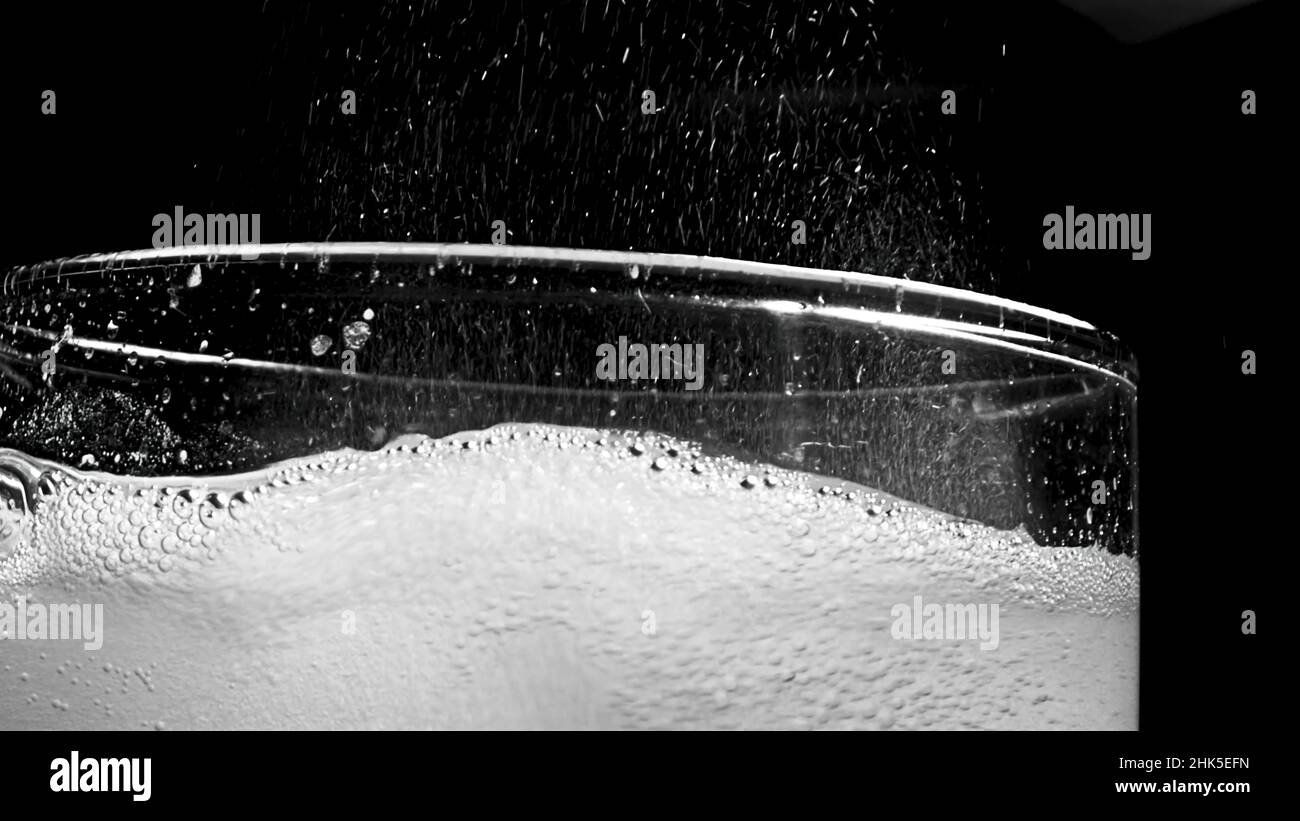 Glass with hissing carbonated bubbles. Stock footage. Close-up of ...