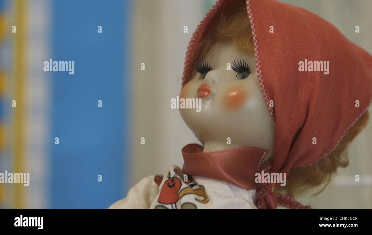Old antique dolls in red dress hi-res stock photography and images - Alamy