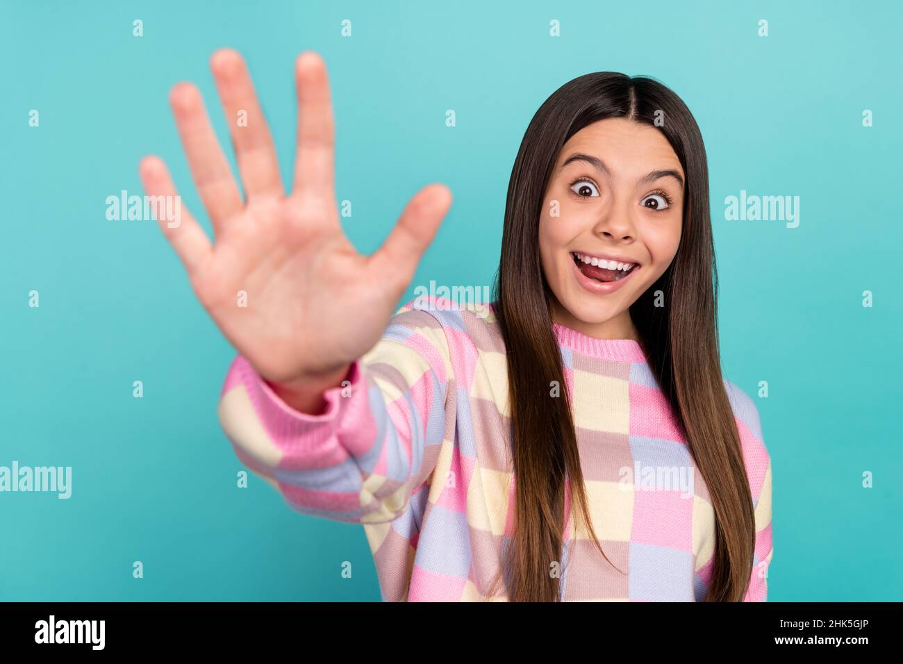 Photo of adorable funky school girl dressed prink pullover waving arm ...