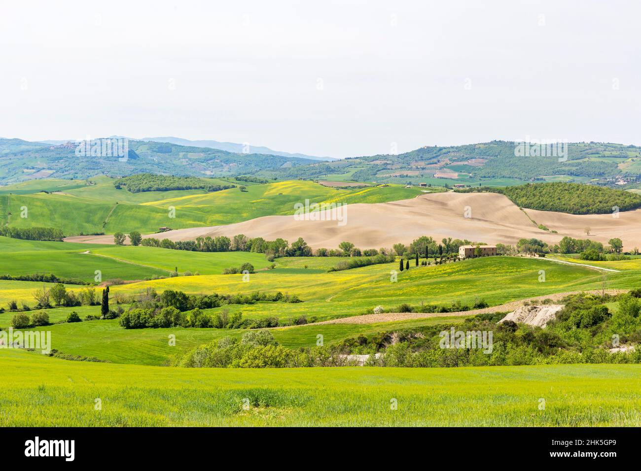 Italian farm on a hill with fields in a rural landscape Stock Photo - Alamy