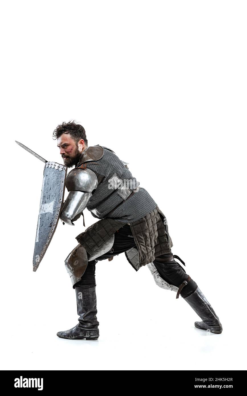 Portrait of brave medieval warrior, knight in special armor protecting ...