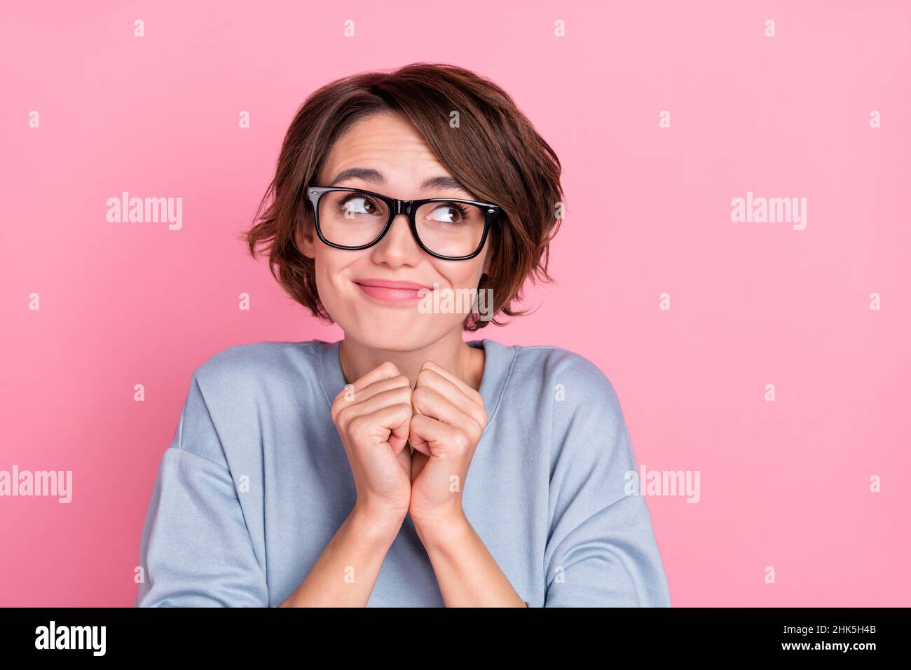 Portrait of attractive cheery girly shy bewildered girl thinking copy ...