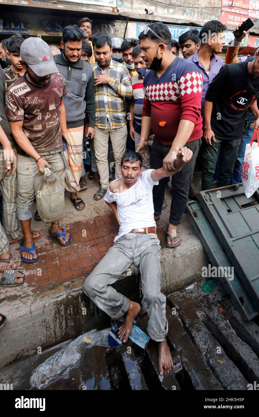 Dhaka, Bangladesh - February 02, 2022: While snatching a woman's mobile ...