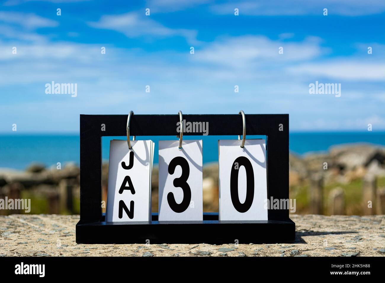 Jan 30 calendar date text on wooden frame with blurred background of ...