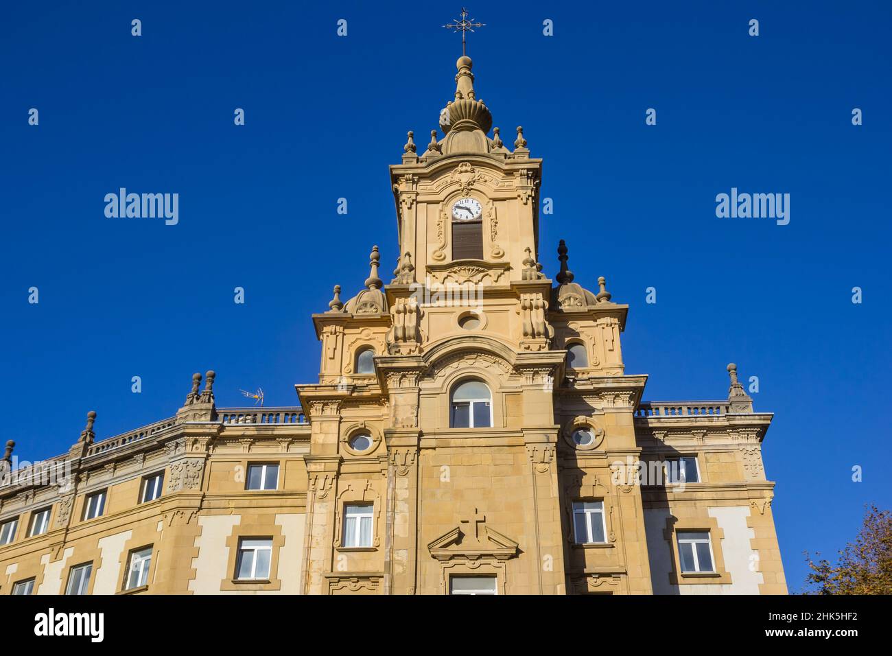 Tower of a historic church building in San Sebastian, Spain Stock Photo ...
