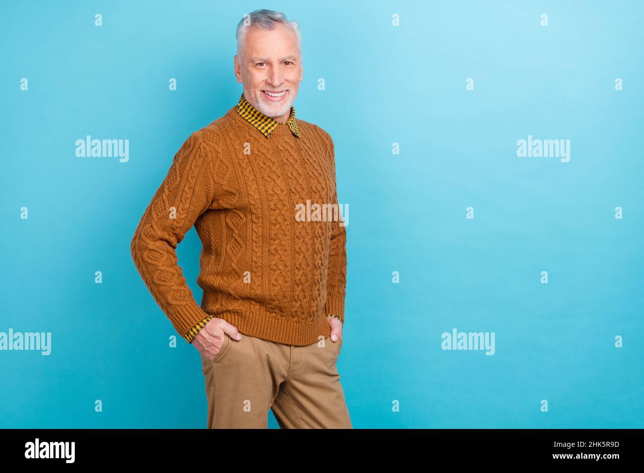 Photo of funny attractive retired man wear brown sweater smiling empty ...