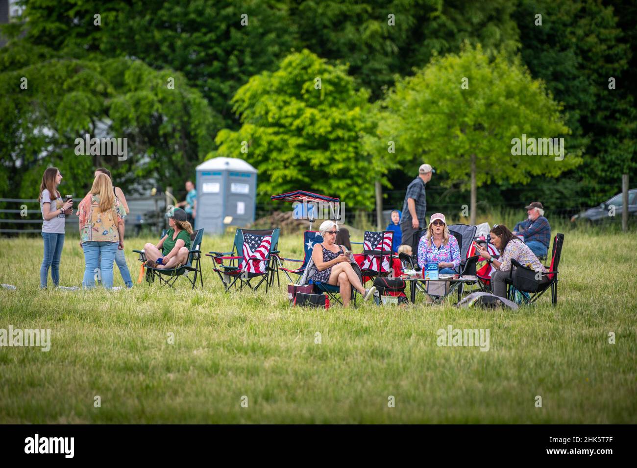 People gathered to enjoy an outdoor farm concert Stock Photo - Alamy
