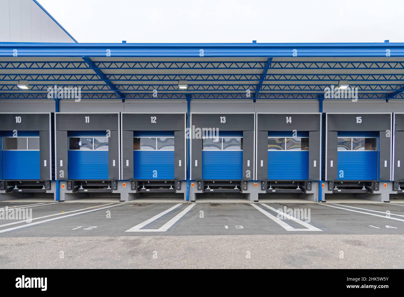 Loading Ramps Dock Doors at Distribution Warehouse Stock Photo - Alamy